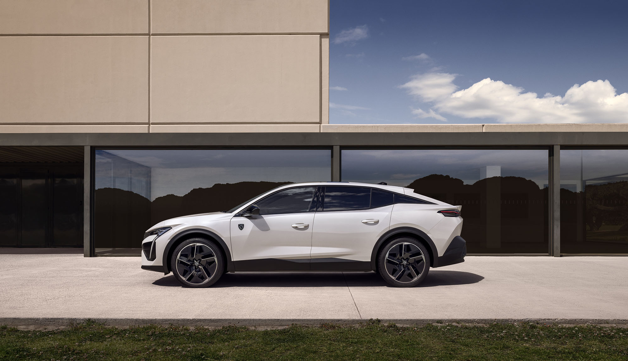 Peugeot E-408: The All-Electric Crossover With Style, Space, And Power | EV Performance